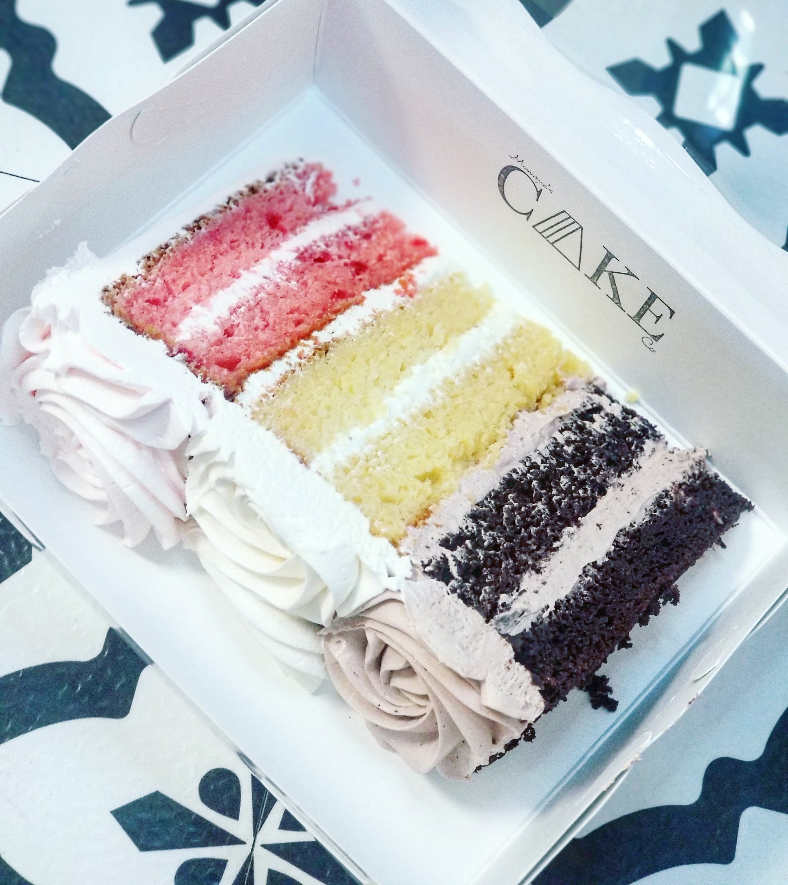Neapolitan 6 Layer Cake Slice | MONIQUE'S CAKE CO.